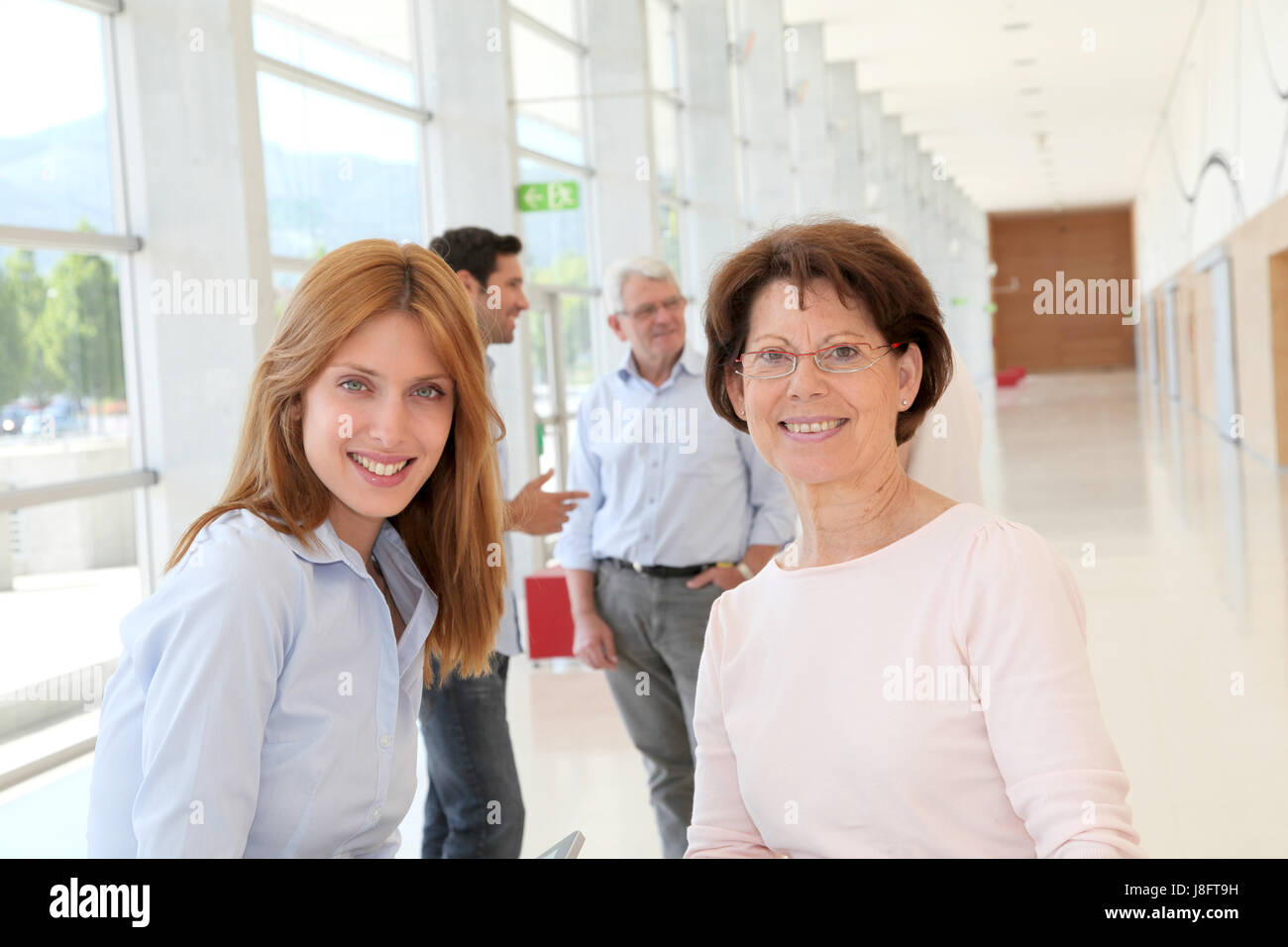 Woman hall office laugh hi-res stock photography and images - Alamy