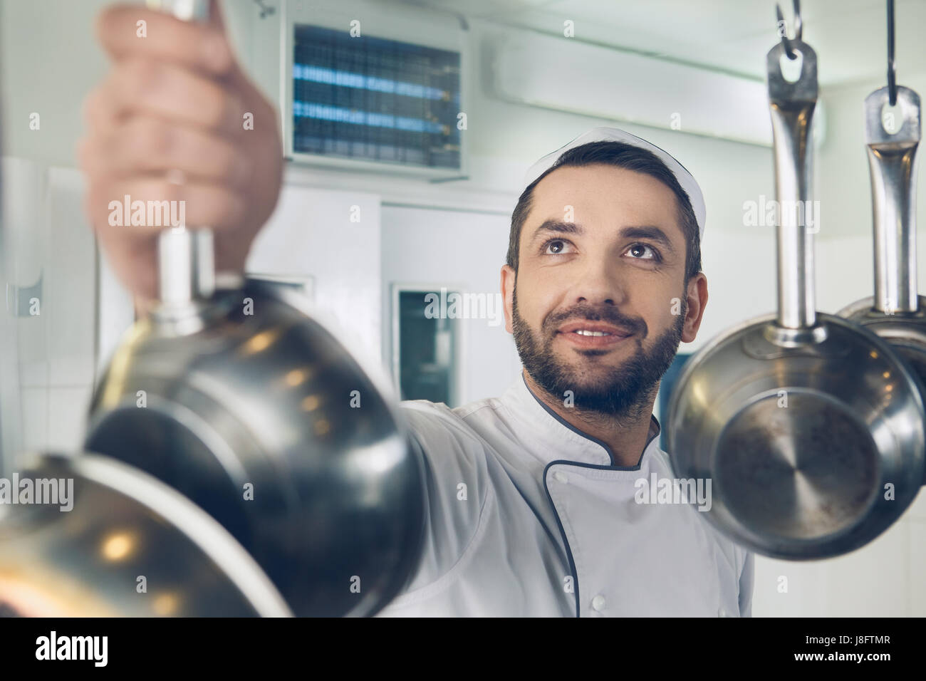 Man japanese restaurant chef working in the kitchen Stock Photo - Alamy