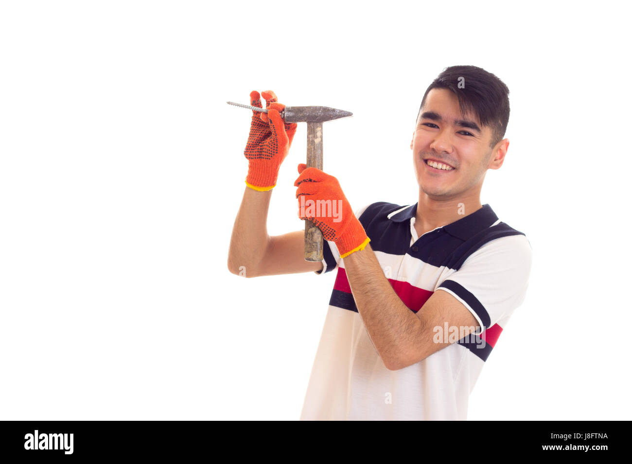 Young smiling man with dark hair in white and blue t-shirt and orange ...