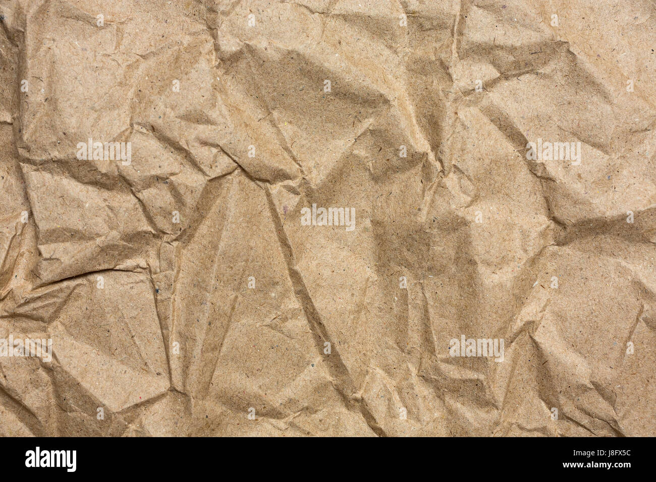 Brown creased paper background texture Stock Photo - Alamy