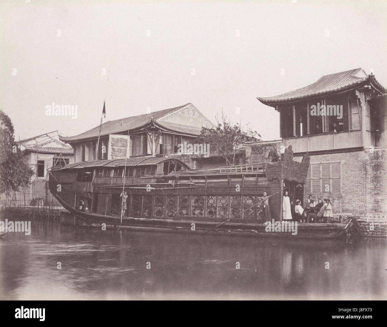 A photograph by Lai Afong from around 1880 depicting Guangzhou along ...