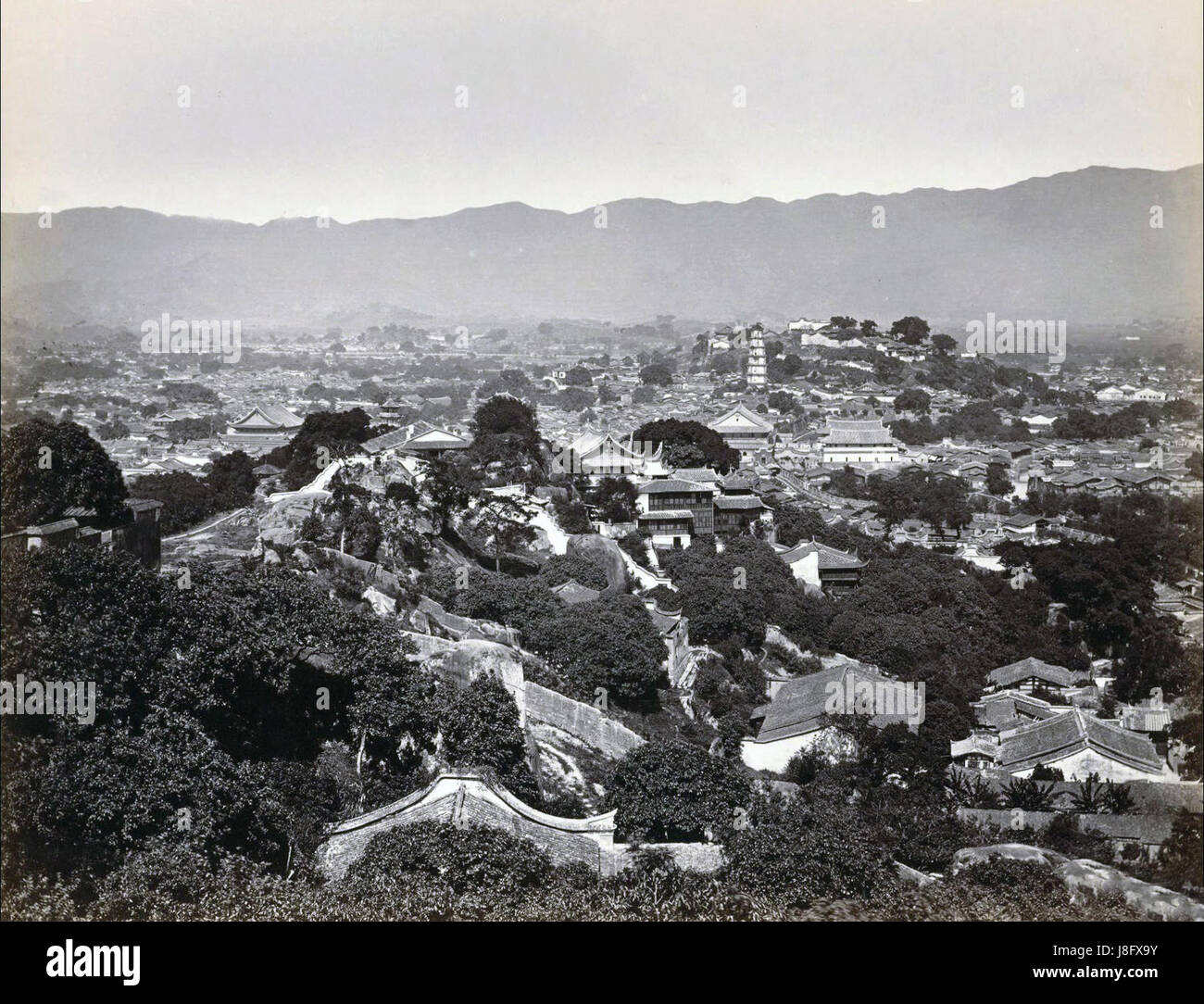 A black-and-white photograph taken in 1870 by Lai Afong, depicting a ...