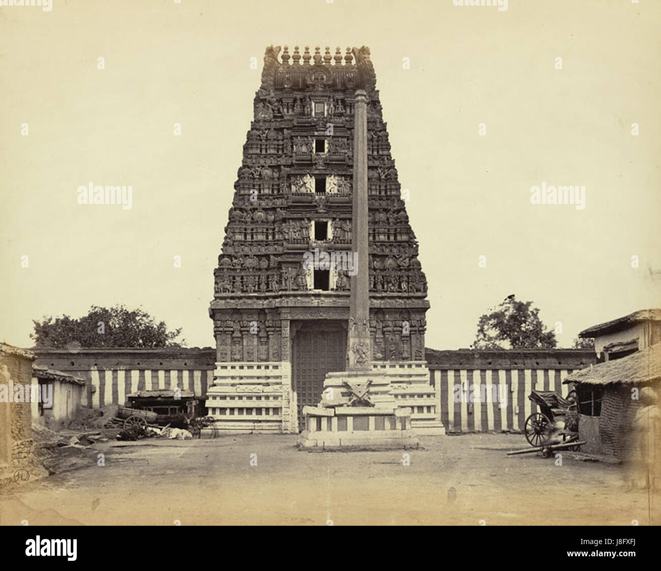 This 1868 photograph by Henry Dixon shows the entrance gopura (gateway ...