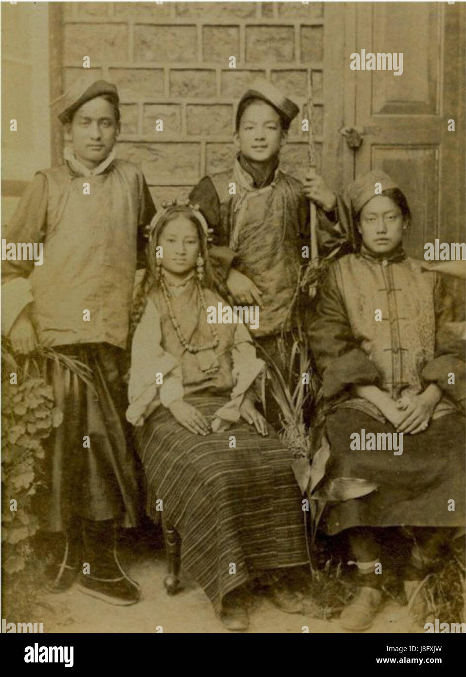 This photograph captures a group of Khasi teenagers in 1865, showcasing ...