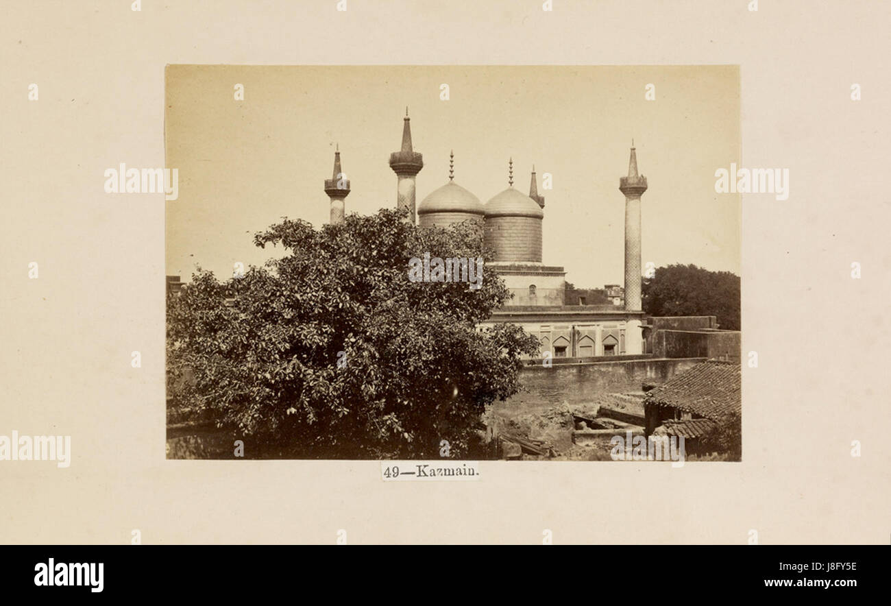 The image captures Kazmain Karbala, Lucknow, in 1874, reflecting the ...