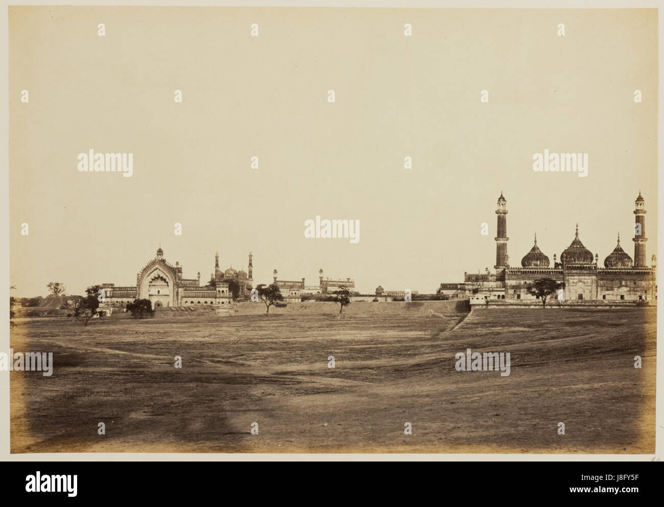This 1862 photograph captures a distant view of the Bara Imambara, a ...