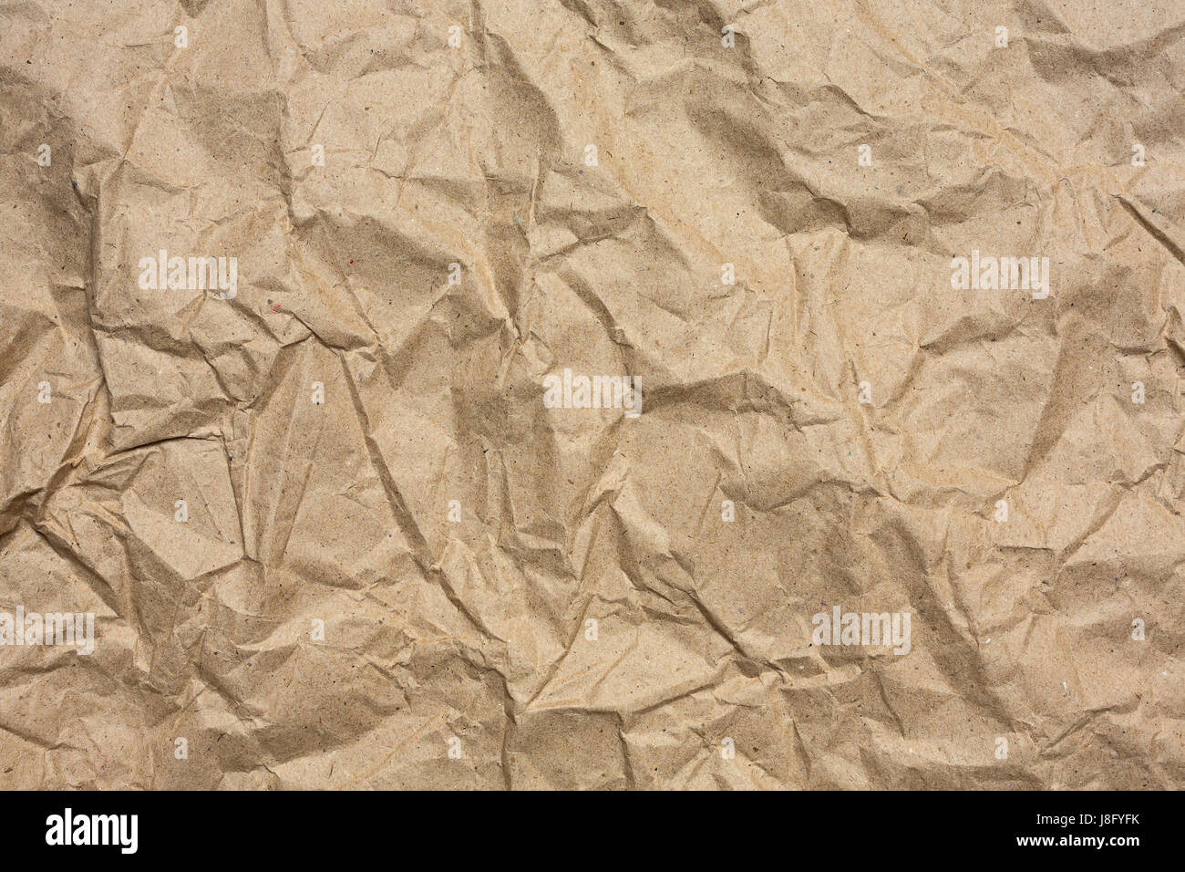 Brown creased paper background texture Stock Photo - Alamy