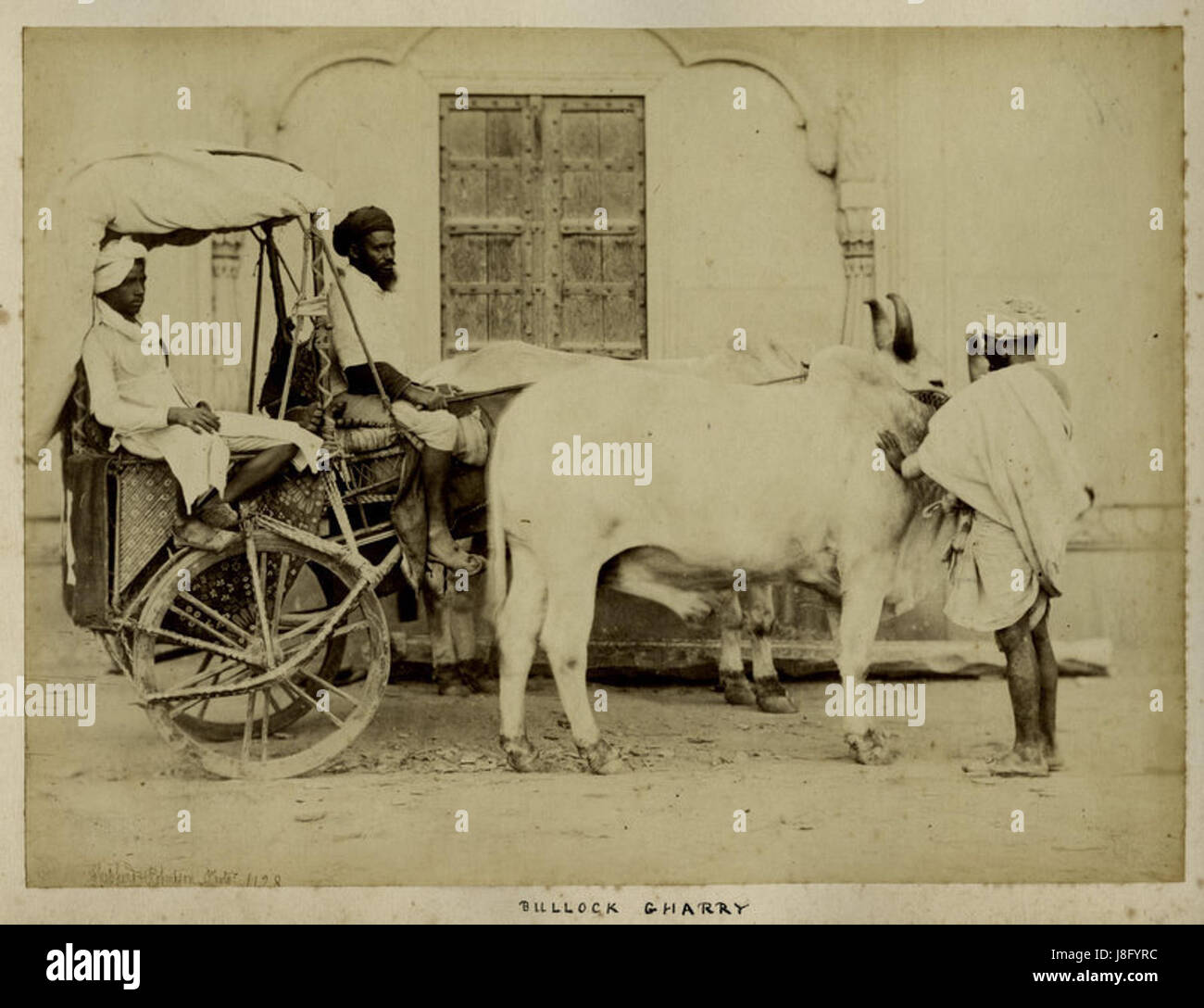 This image depicts an Indian bullock cart from the 1860s, a common form ...