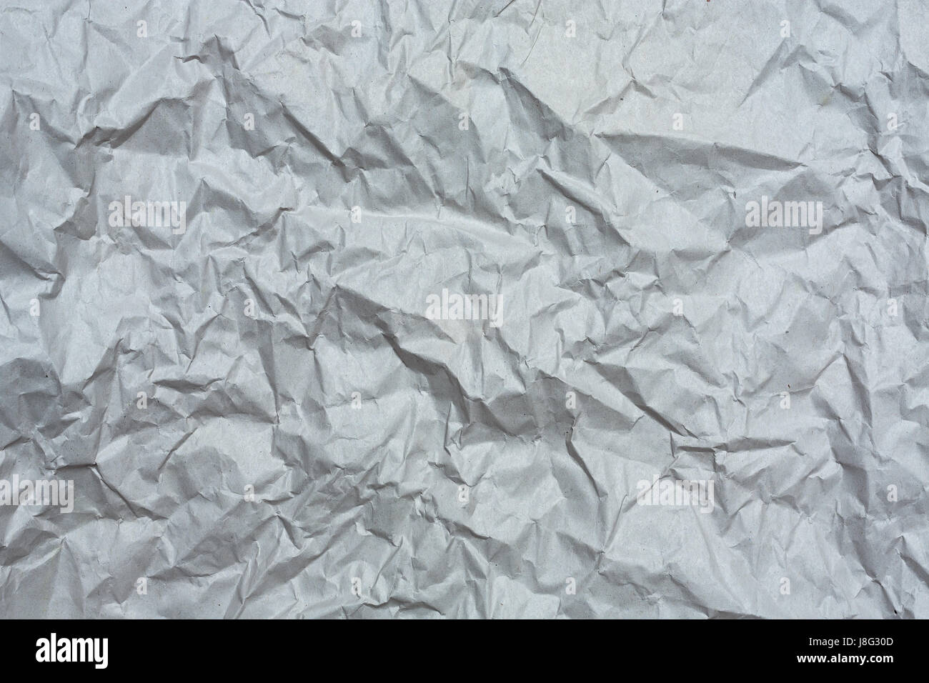 Gray beige creased paper background texture Stock Photo - Alamy