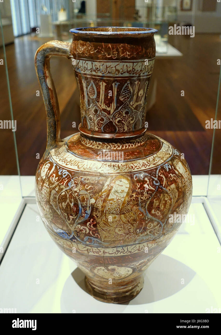 This 13th-century Iranian jar, crafted from fritware and decorated with ...