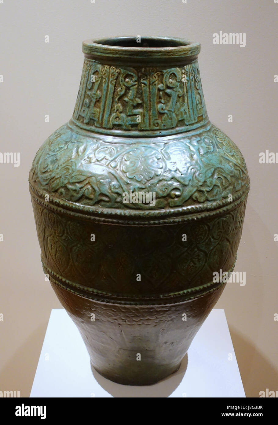 This 13th-century Iranian jar, made of moulded and glazed fritware ...