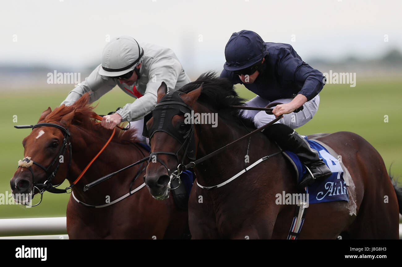 Homesman ridden by Ryan Moore (right) on the way to winning the Airlie ...
