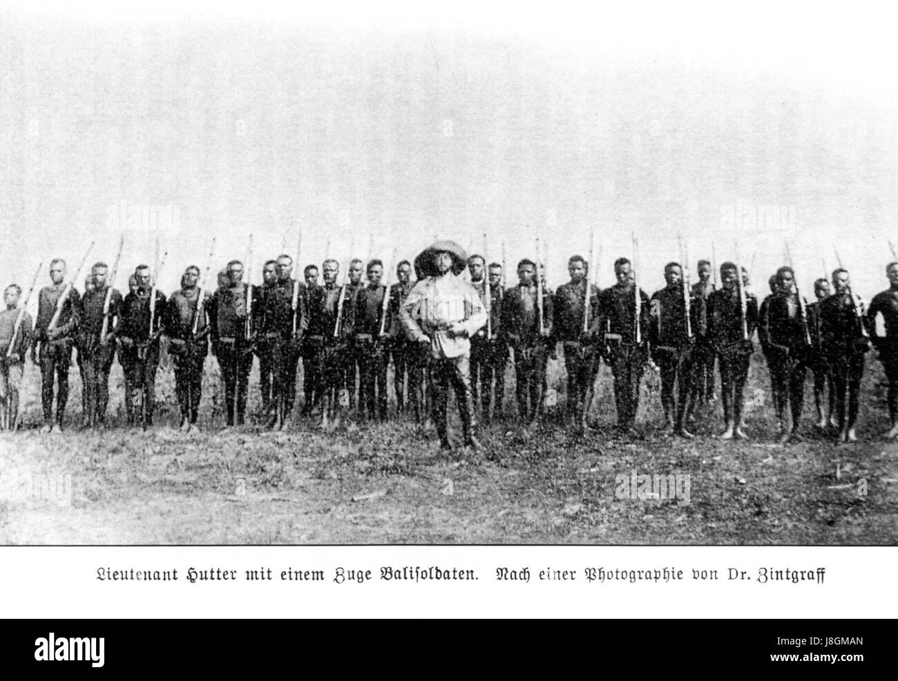 Hutter with bali soldiers Stock Photo - Alamy