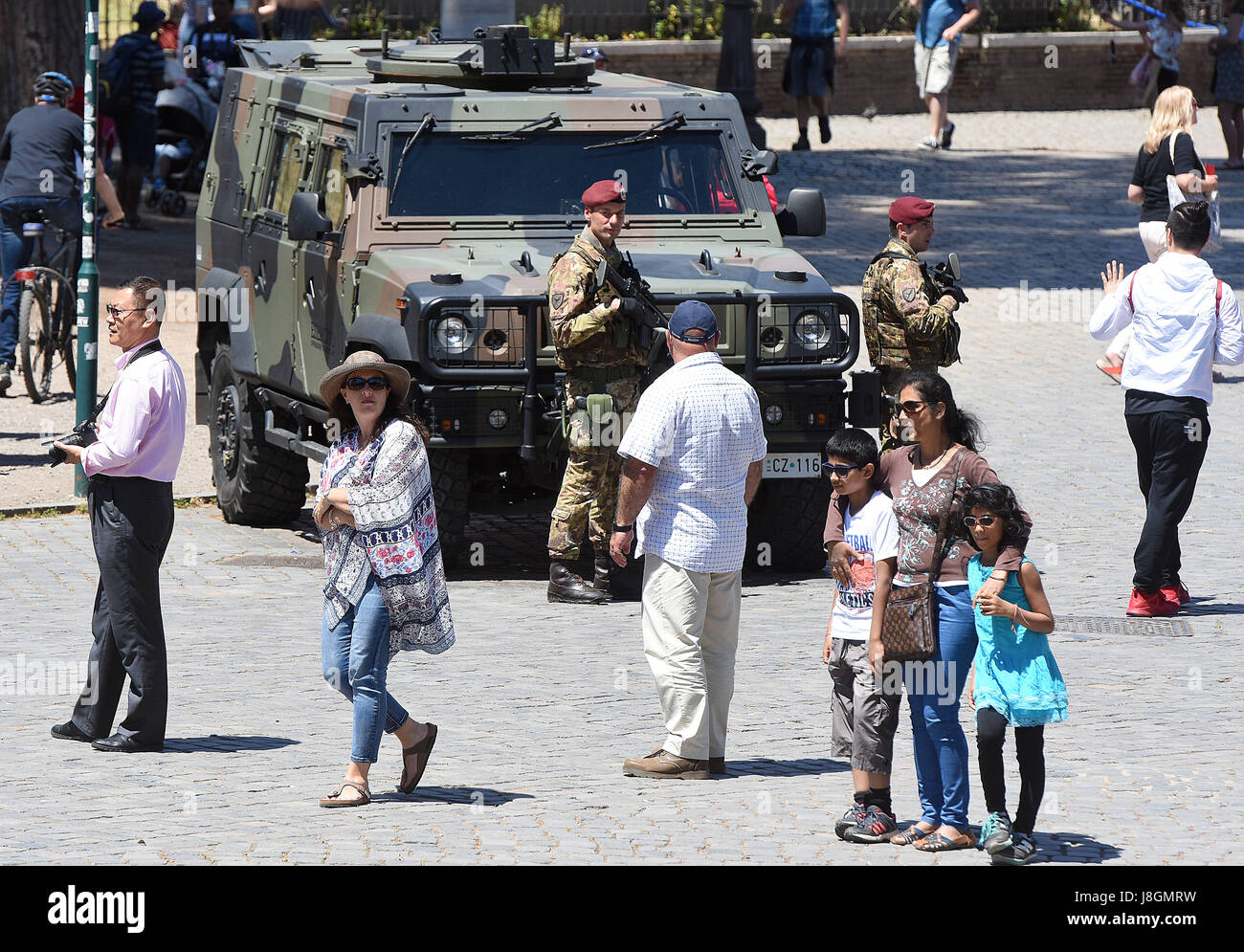 Soldiers stand guard on the streets of Rome to protect tourists from ...