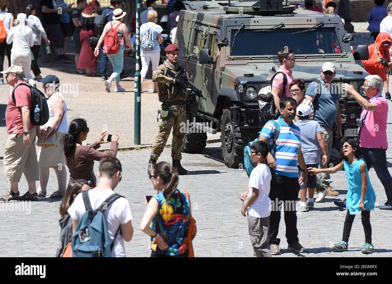 Soldiers stand guard on the streets of Rome to protect tourists from ...