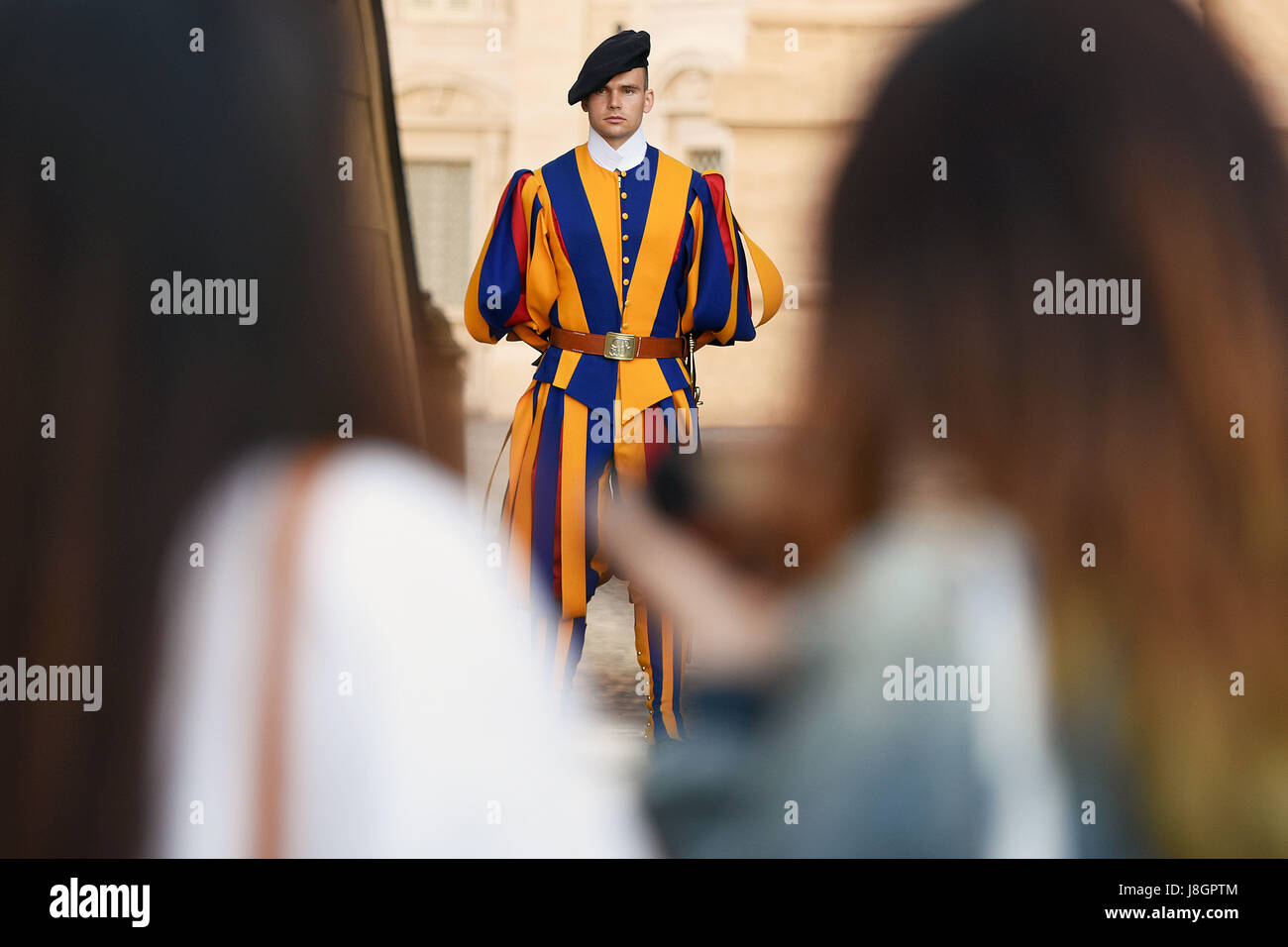 A Member of the Swiss Guard at St Peters basilica in the Vatican City ...
