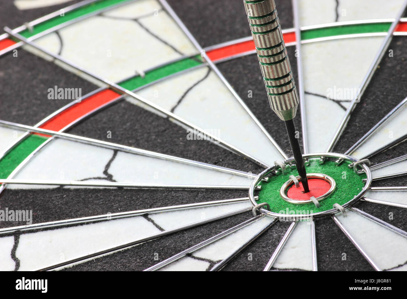 steel dart hit the mark Stock Photo - Alamy
