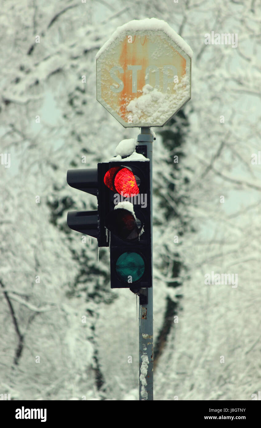 Snow covered red and white stop sign hi-res stock photography and ...