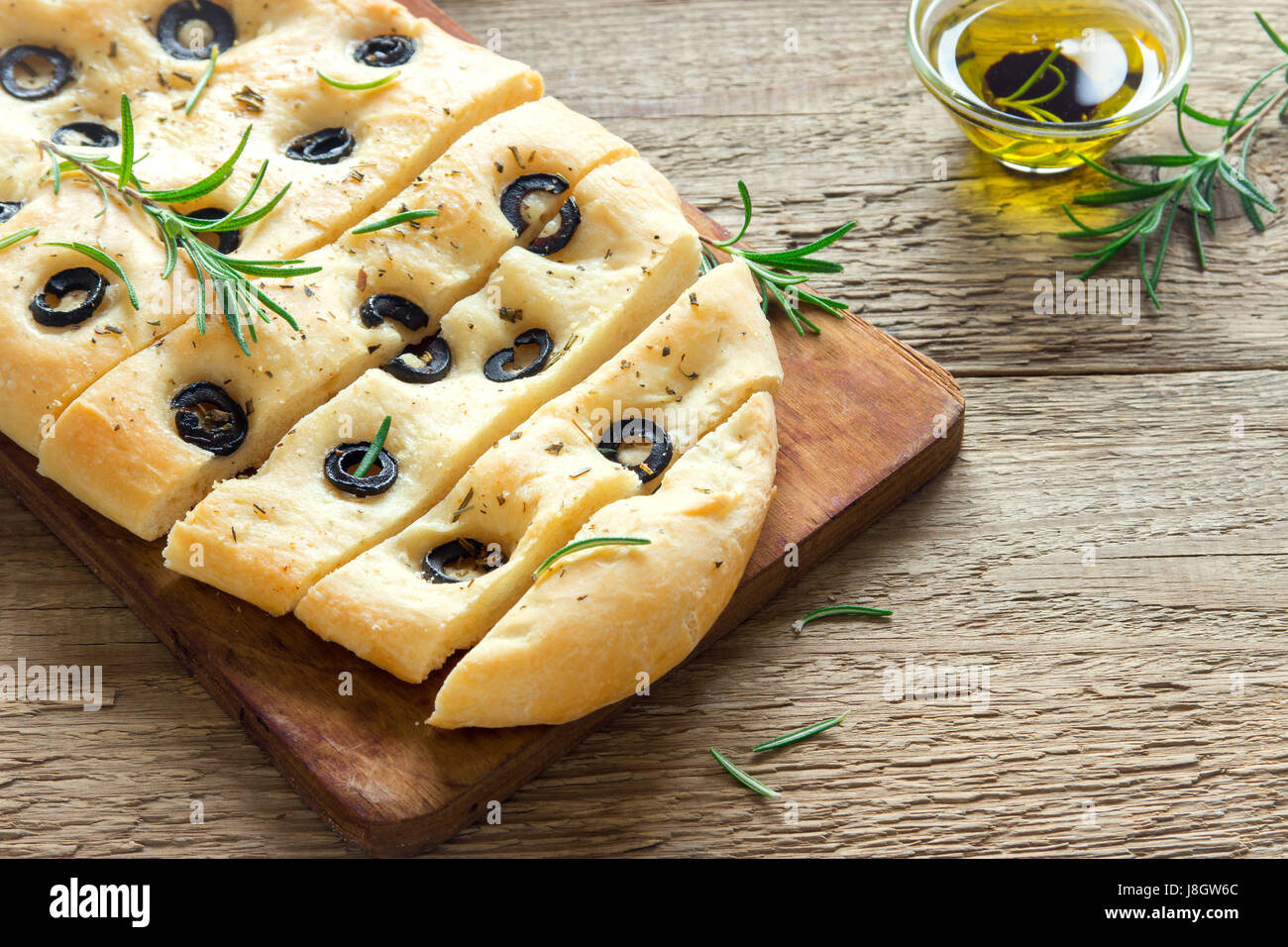 Traditional Italian Focaccia with black olives and rosemary - homemade ...