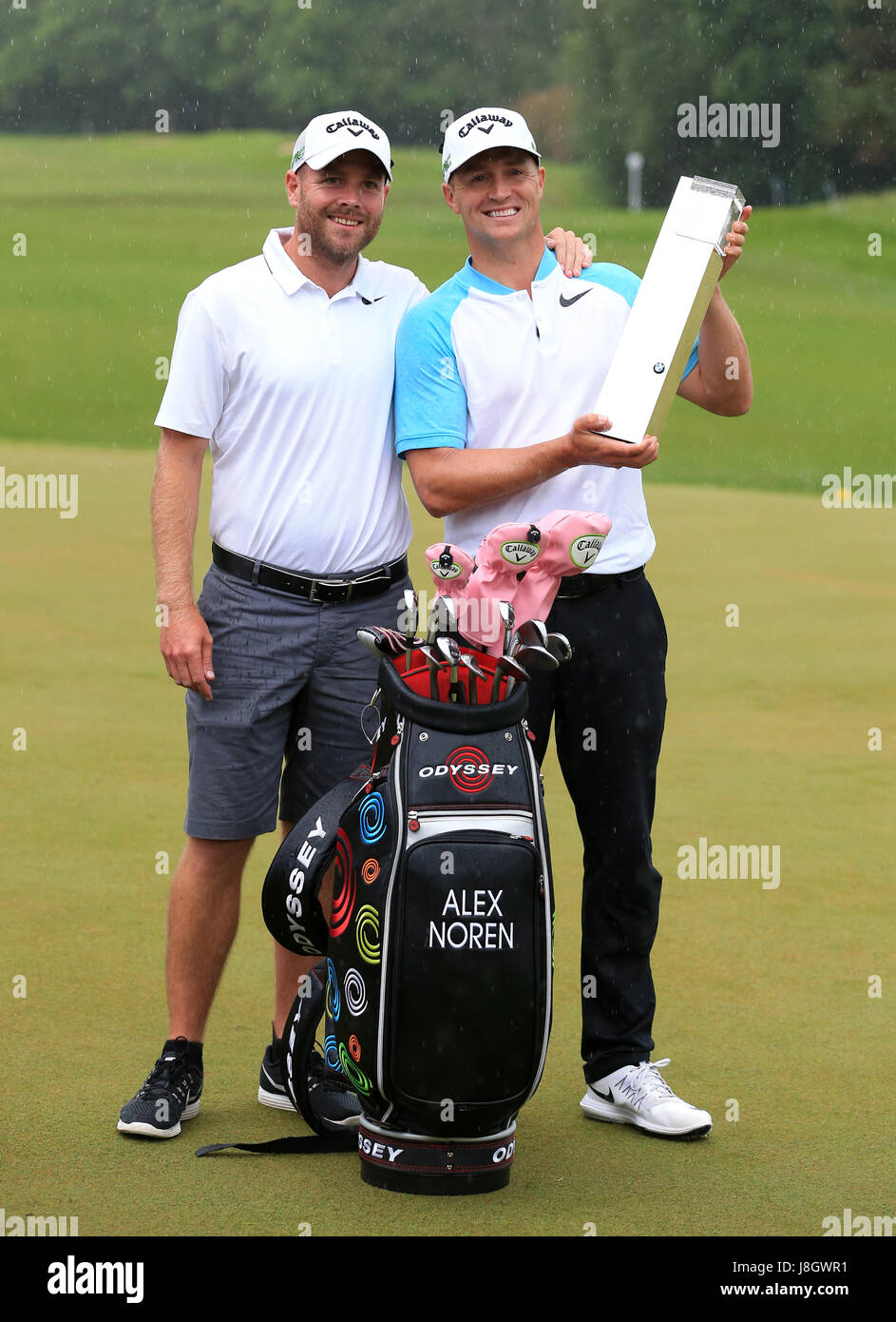 Sweden's Alex Noren (right)poses with the trophy and his caddy Lee ...