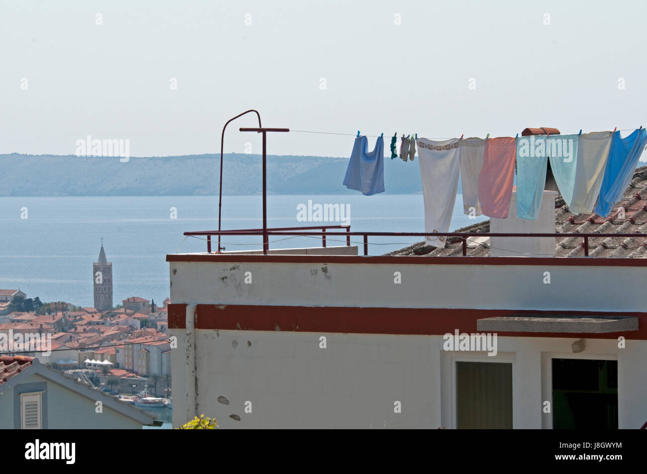Laundry drying on rooftop clothes line hi-res stock photography and ...