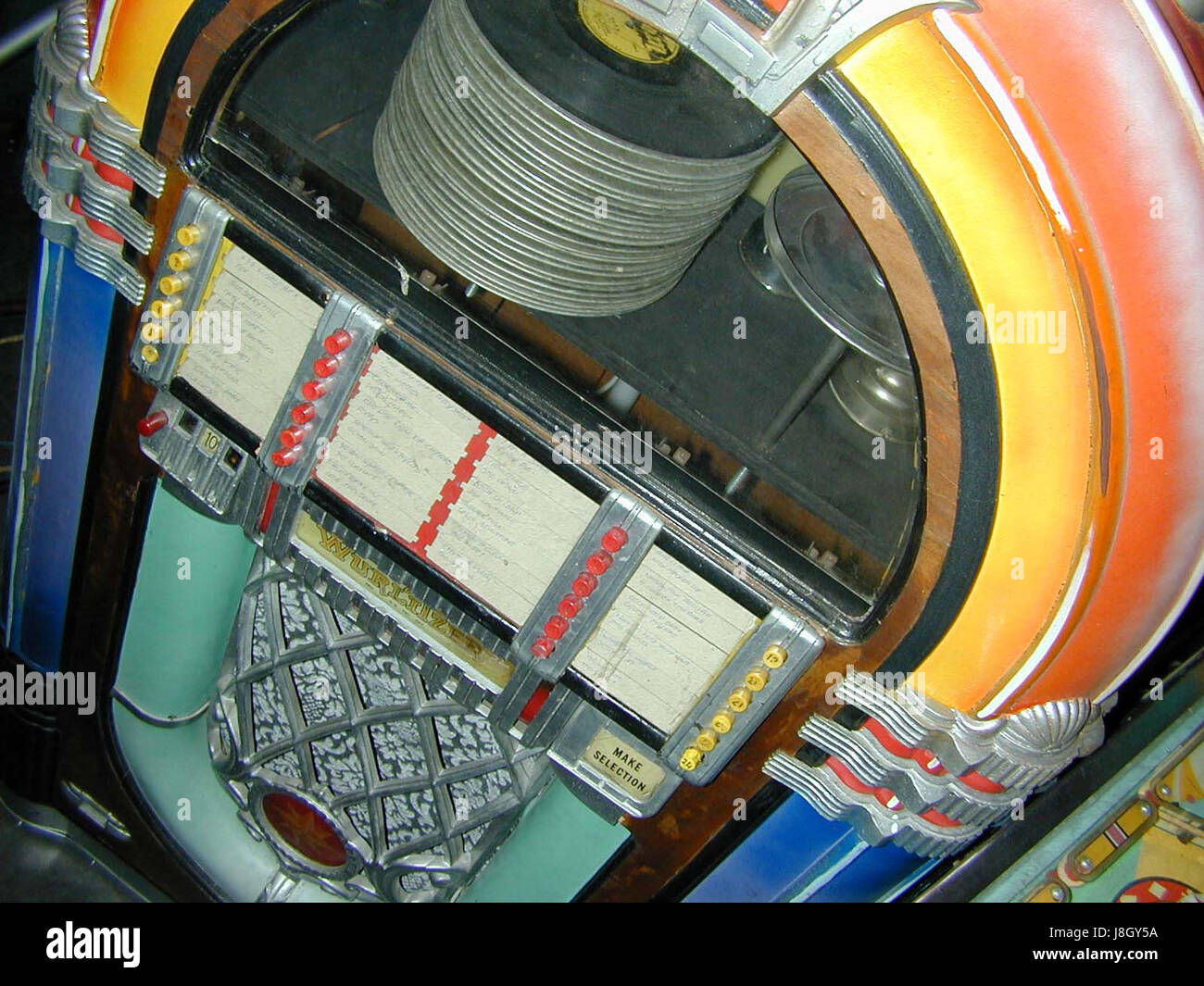 A vintage jukebox decorated with slightly faded colours Stock Photo - Alamy