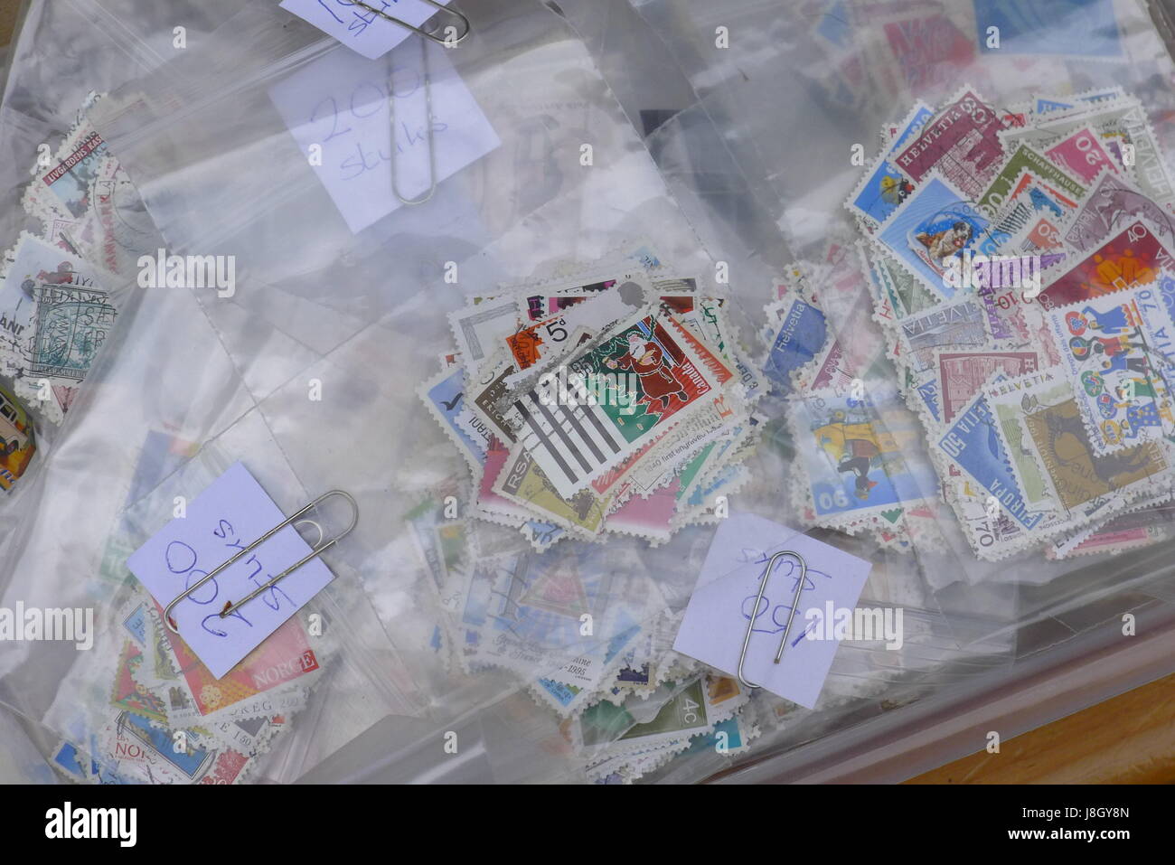 An organised collection of postal stamps in seperate plastic bags Stock ...
