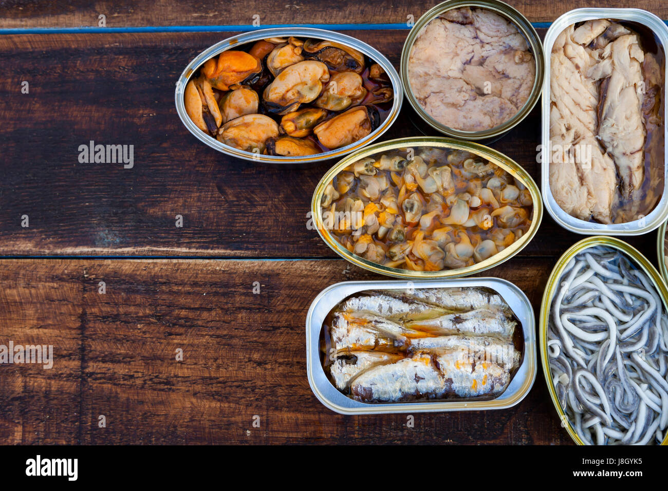 Assortment of open tin cans for a healthy dinner Stock Photo - Alamy