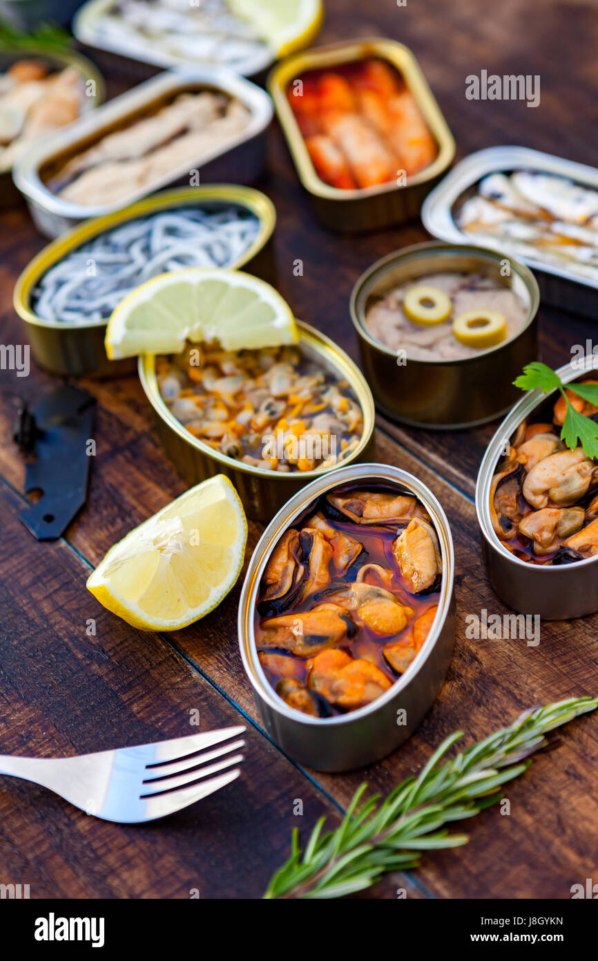 Assortment of open tin cans for a healthy dinner Stock Photo - Alamy