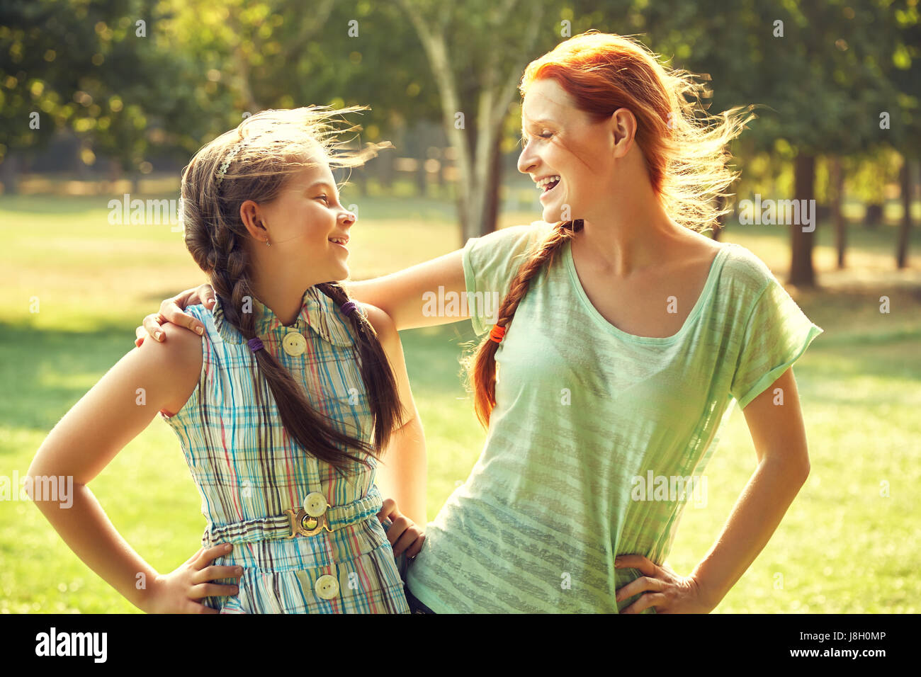 hugging happy mother and daughter Stock Photo - Alamy