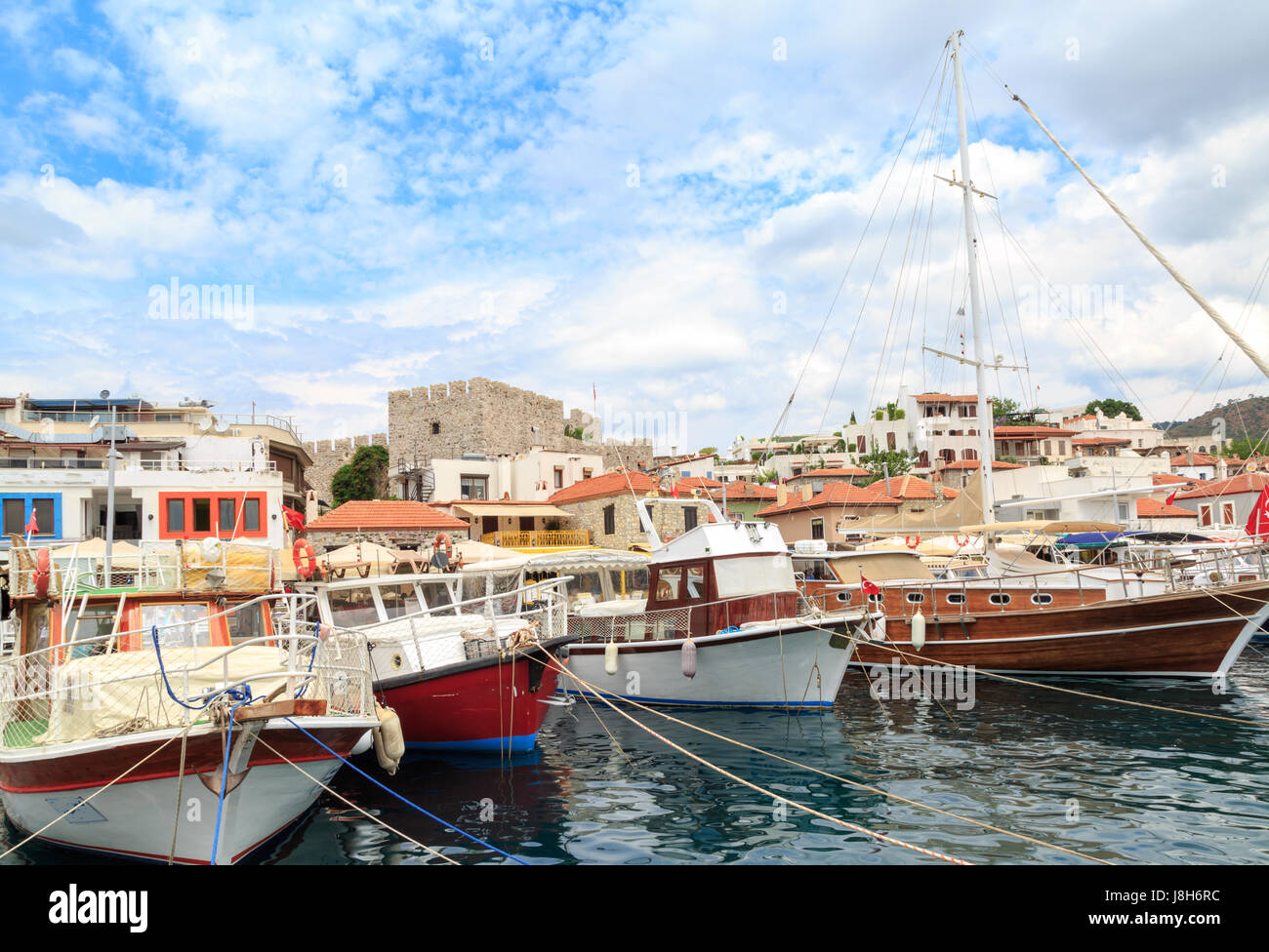 Marmaris castle in marmaris port with boats and sea view Stock Photo ...