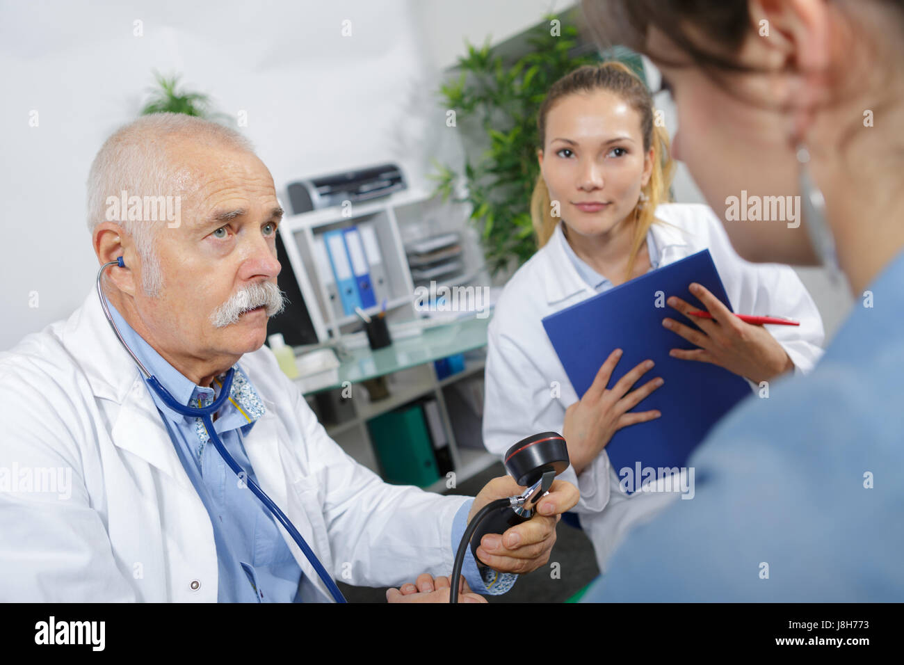 intern observing the procedure Stock Photo - Alamy