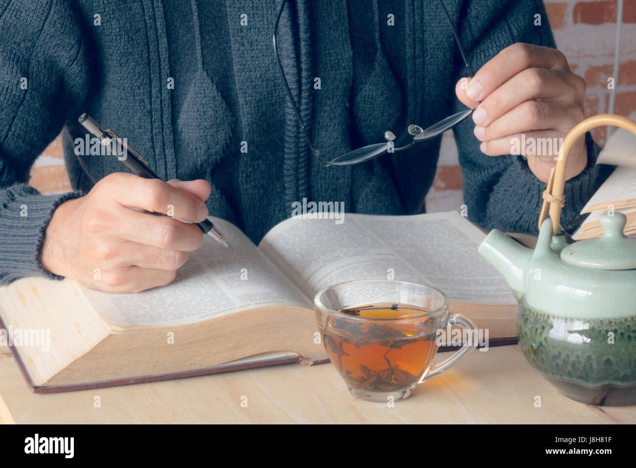 Eat hot tea at Reading Stock Photo - Alamy