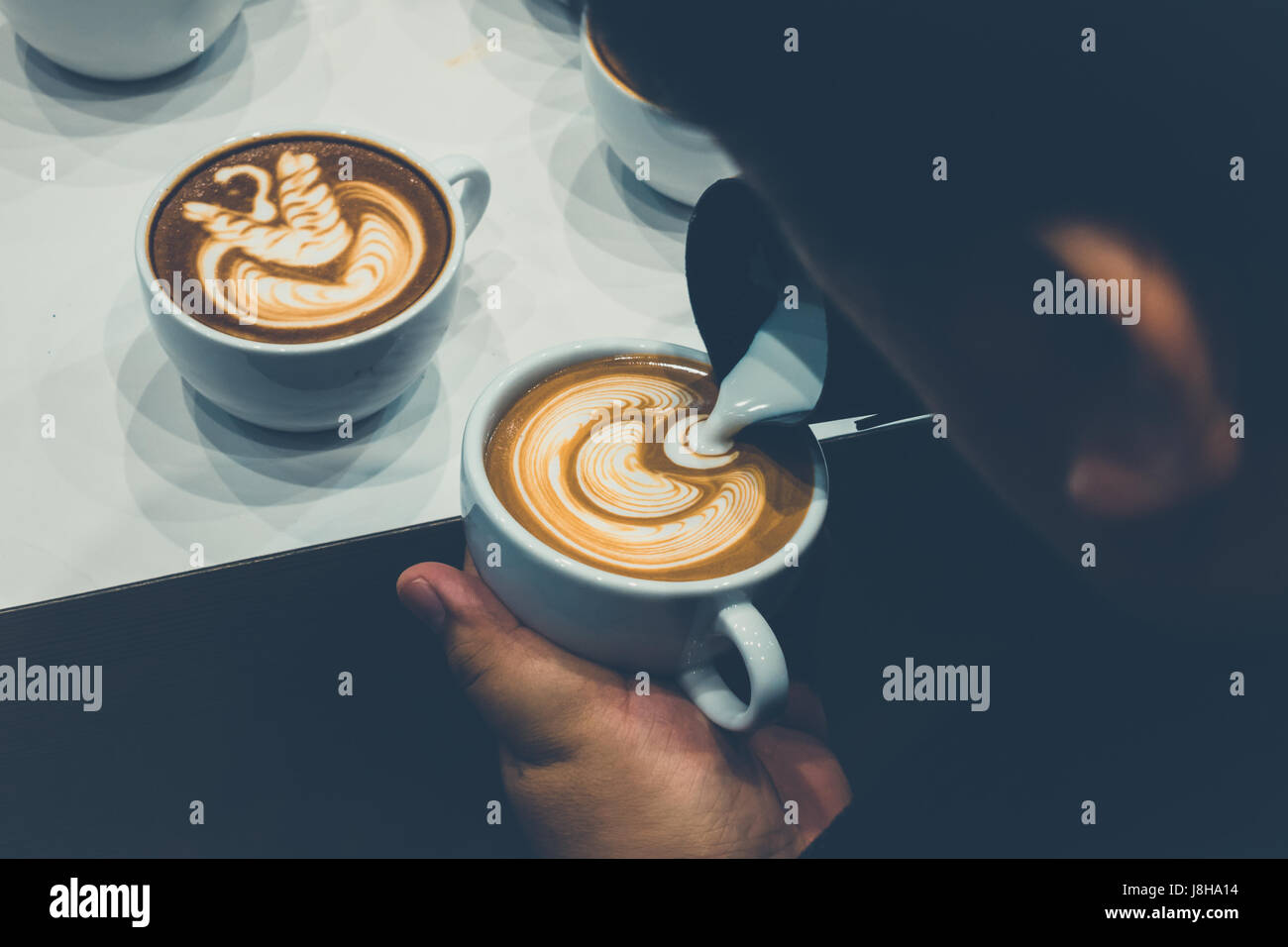 The process of making coffee Cup of coffee with beautiful Latte art ...