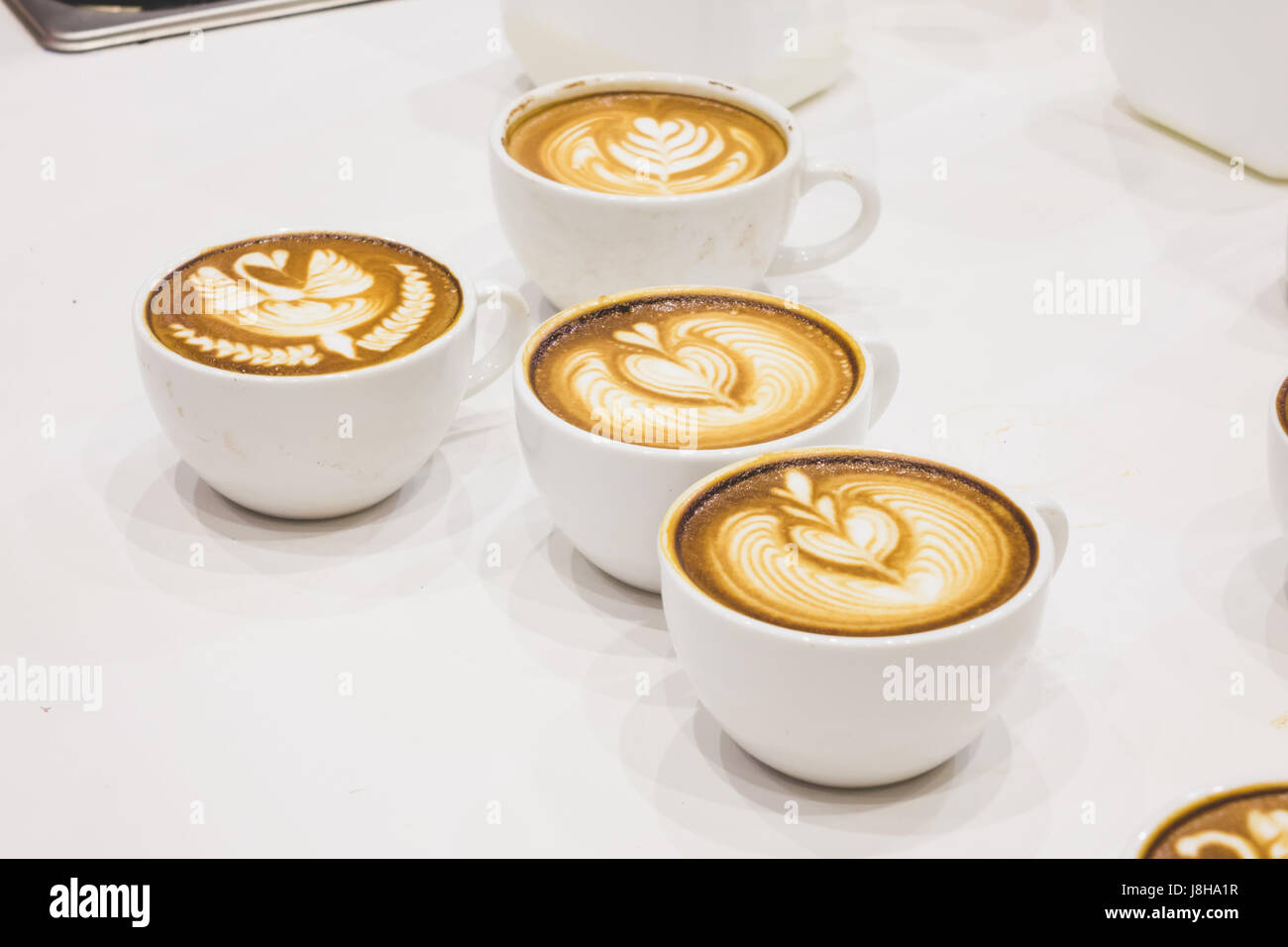 Cup of coffee with beautiful Latte art forms Stock Photo - Alamy