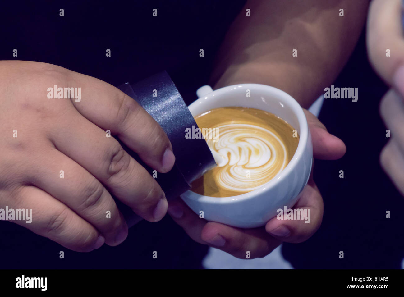 The process of making coffee Cup of coffee with beautiful Latte art ...