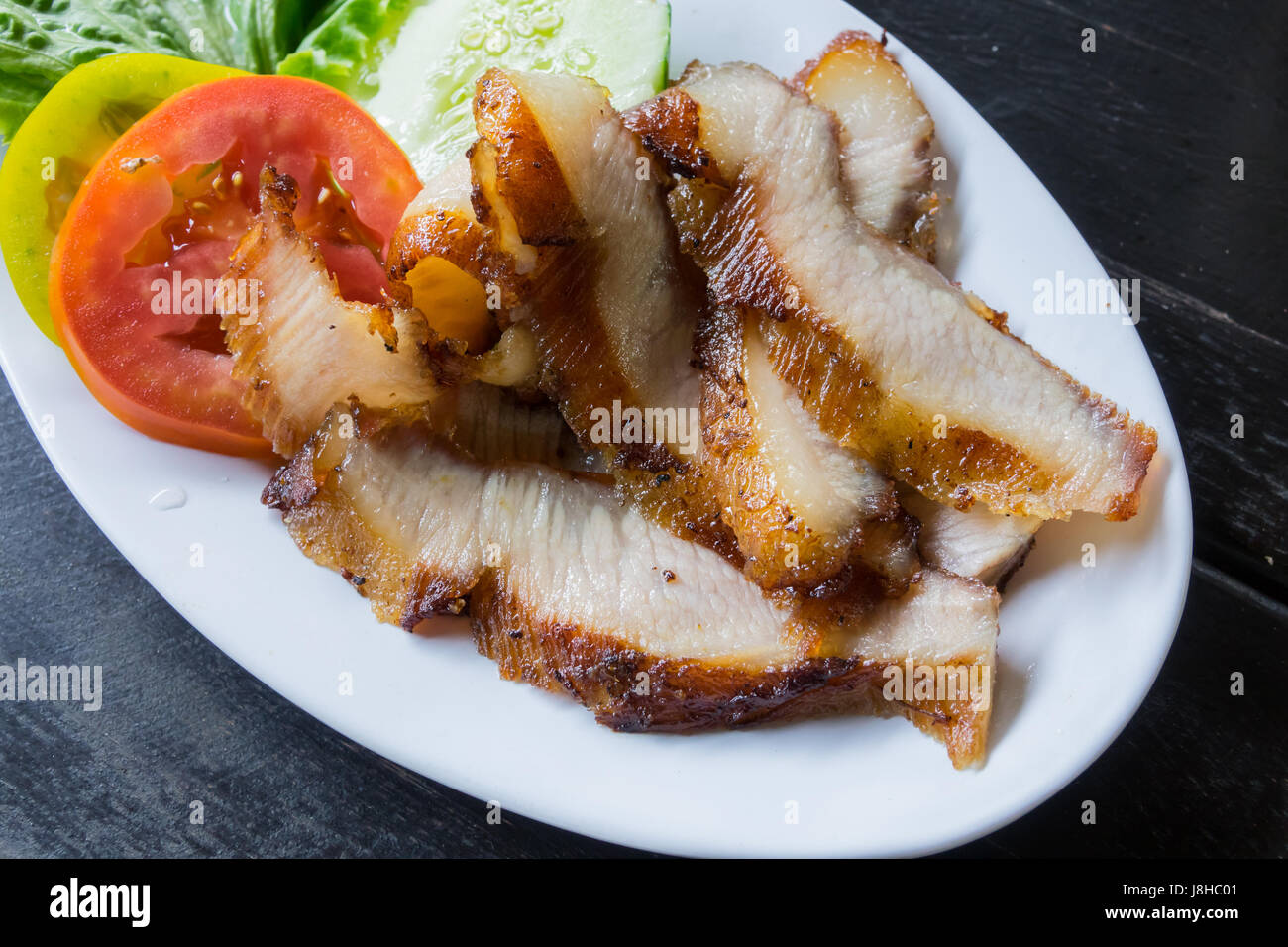 Grill pork neck on white plate Stock Photo - Alamy