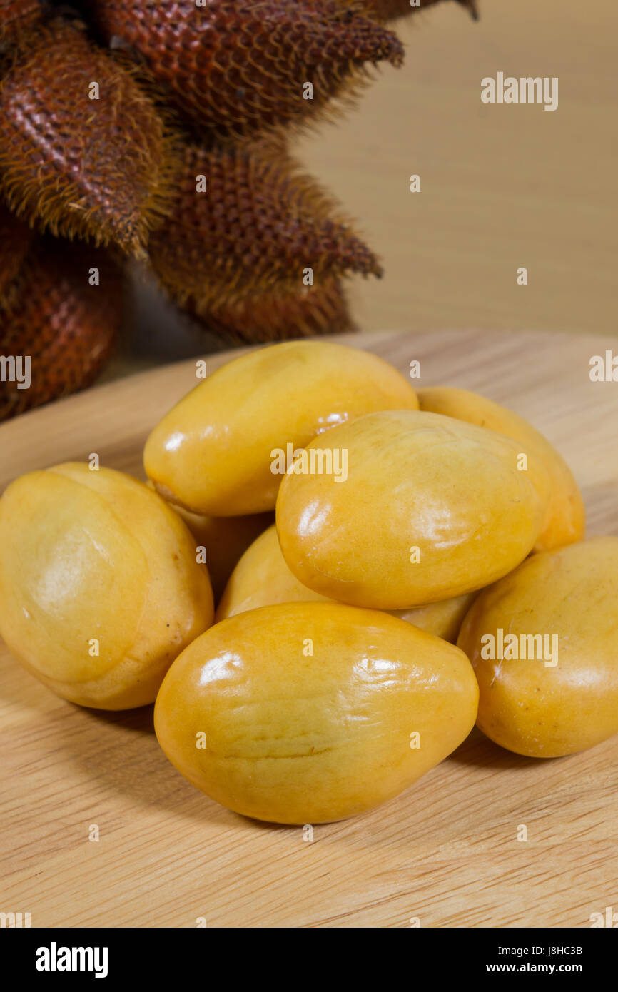 Close up of salak fruit ( Salacca zalacca) on wood background Stock ...