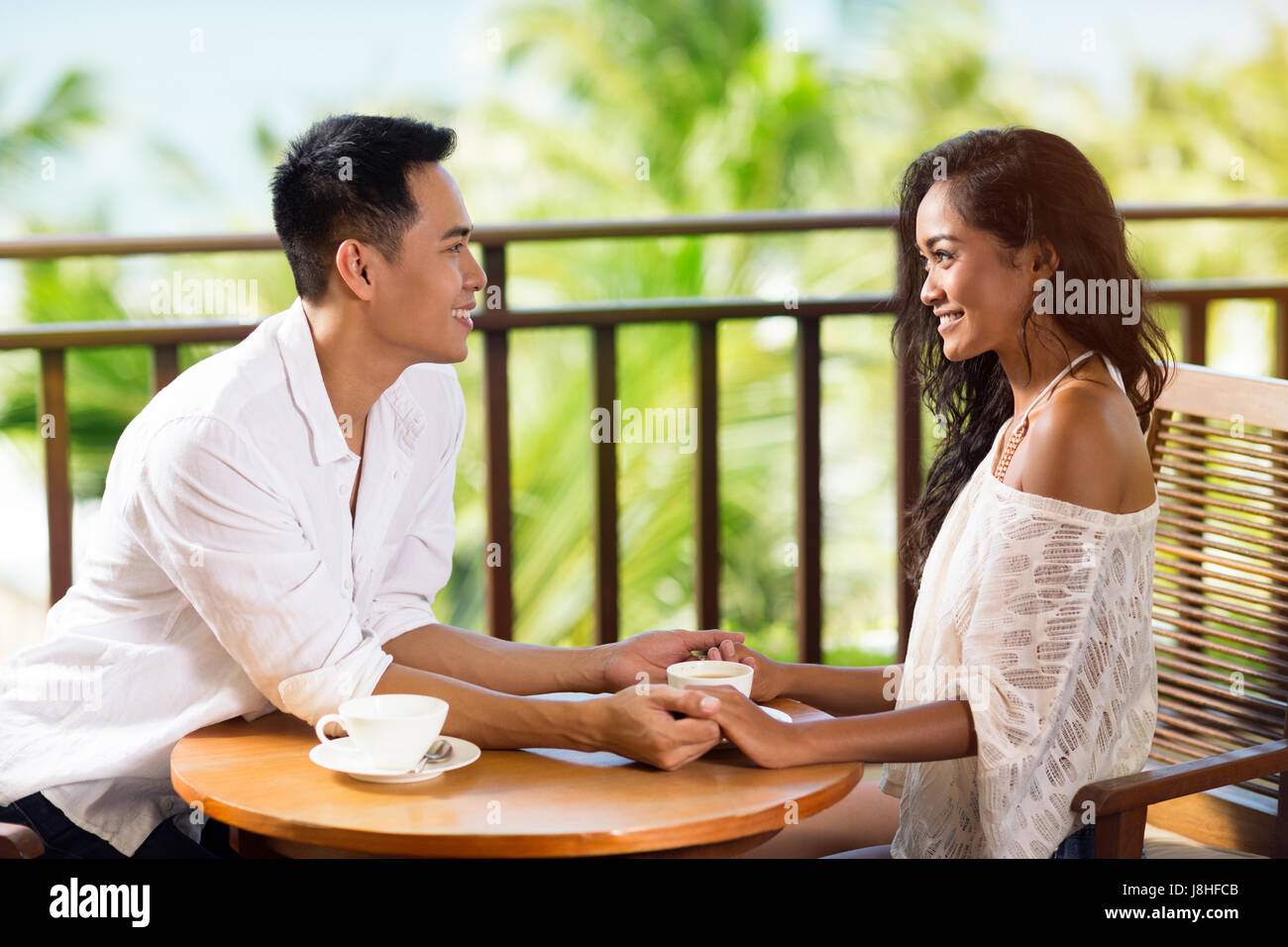 Couple coffee balcony hi-res stock photography and images - Alamy