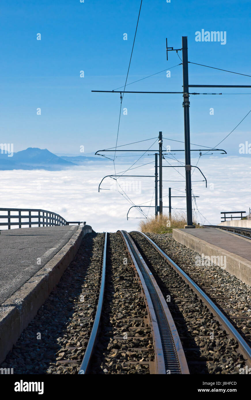 rails above the clouds Stock Photo - Alamy