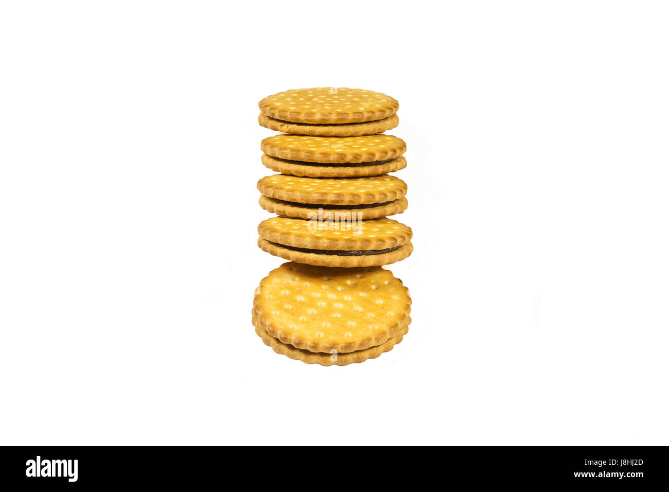 Round biscuits with chocolate filling on a light background Stock Photo ...