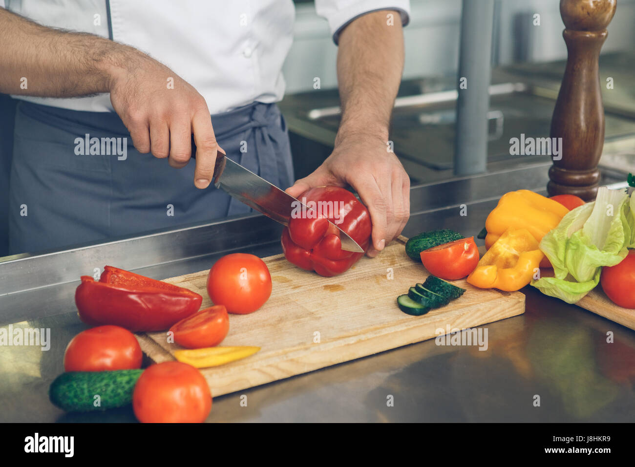 Man japanese restaurant chef cooking in the kitchen Stock Photo - Alamy