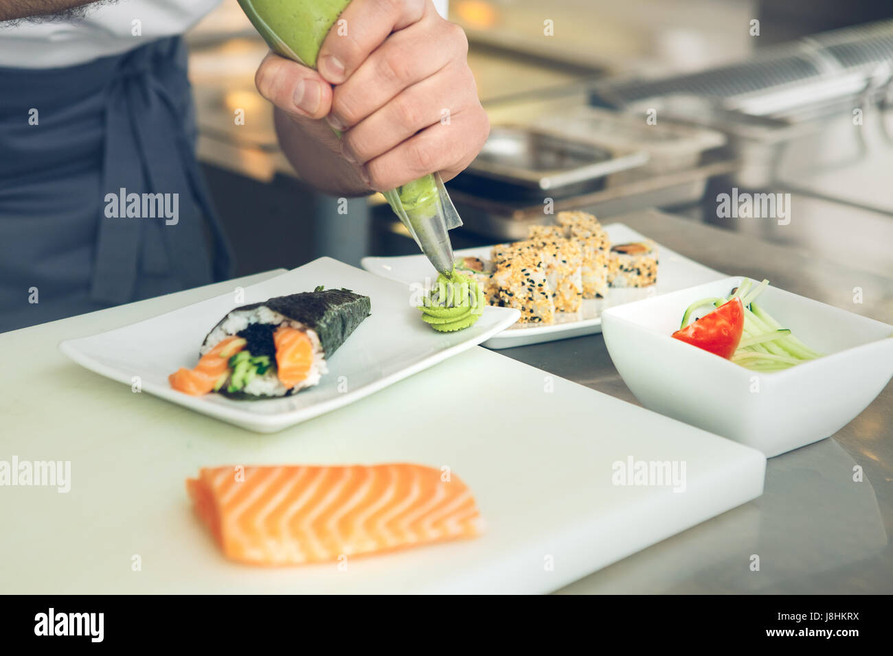 Man japanese restaurant chef cooking in the kitchen Stock Photo - Alamy