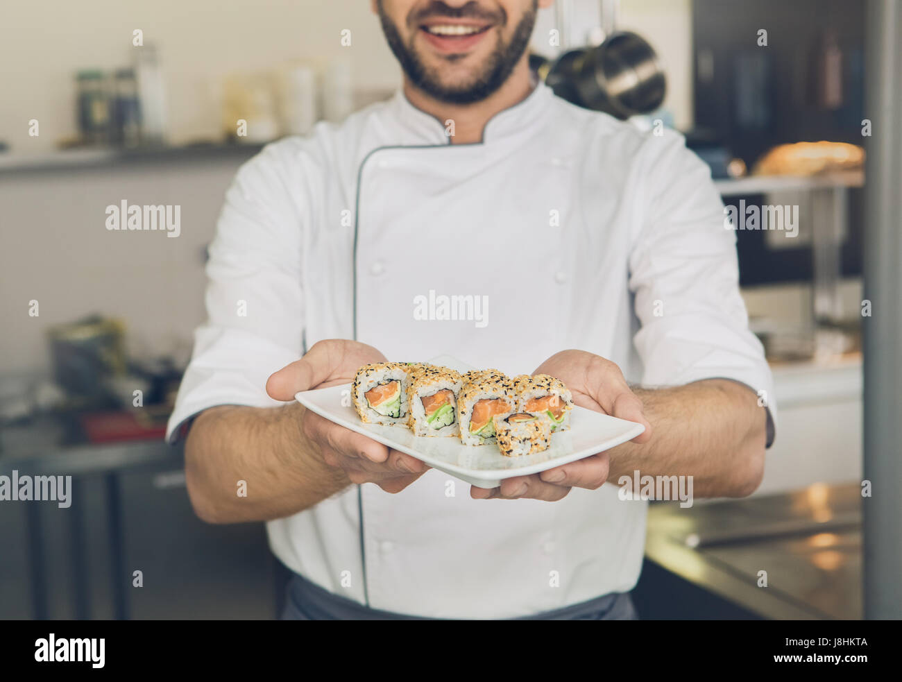 Man japanese restaurant chef cooking in the kitchen Stock Photo - Alamy