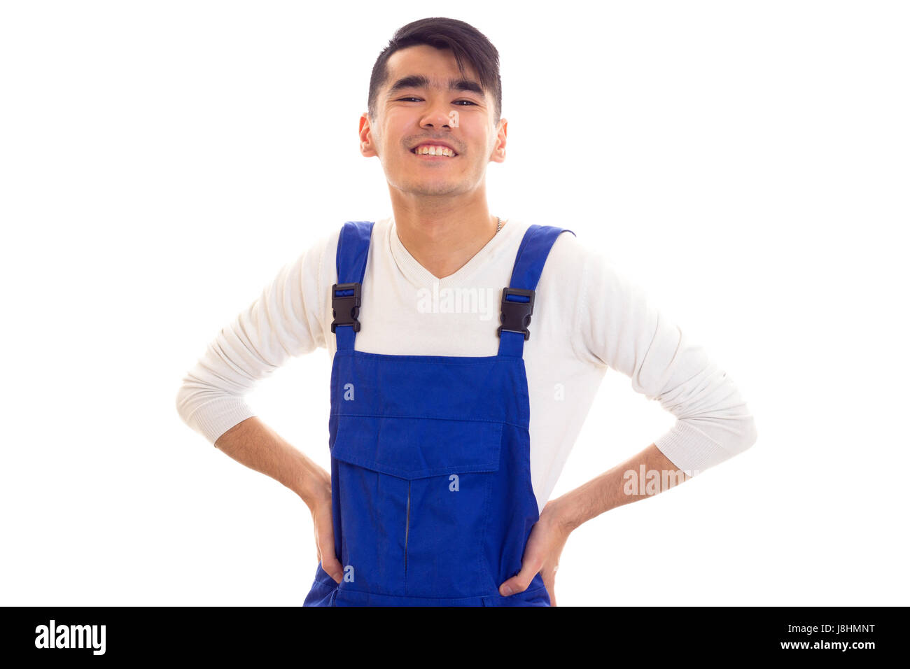 Man wearing blue overalls hi-res stock photography and images - Alamy