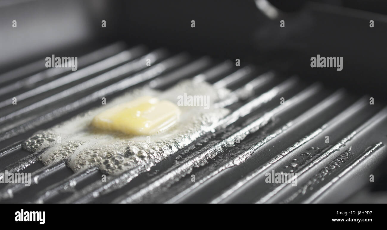 Melting butter heat hi-res stock photography and images - Alamy