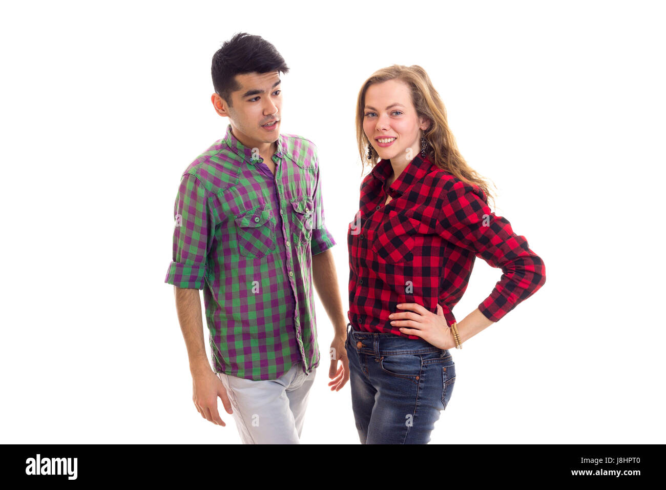 Young couple in plaid shirts Stock Photo - Alamy