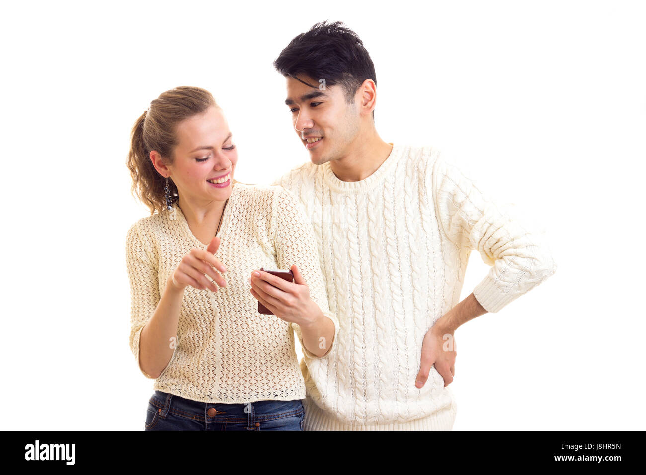 Beautiful couple using smart hi-res stock photography and images - Alamy