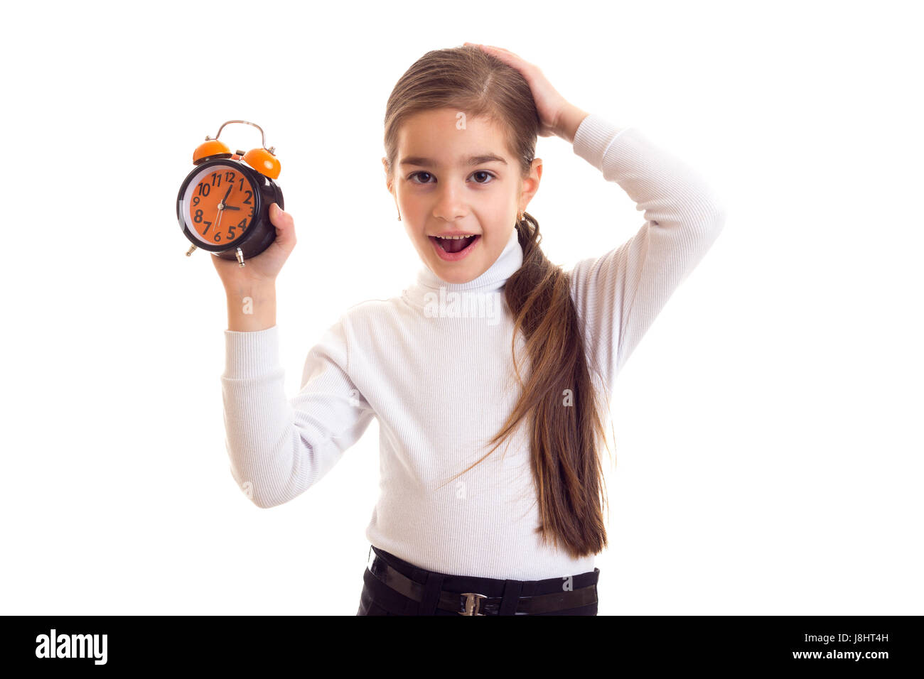 Little girl holding a clock Stock Photo - Alamy