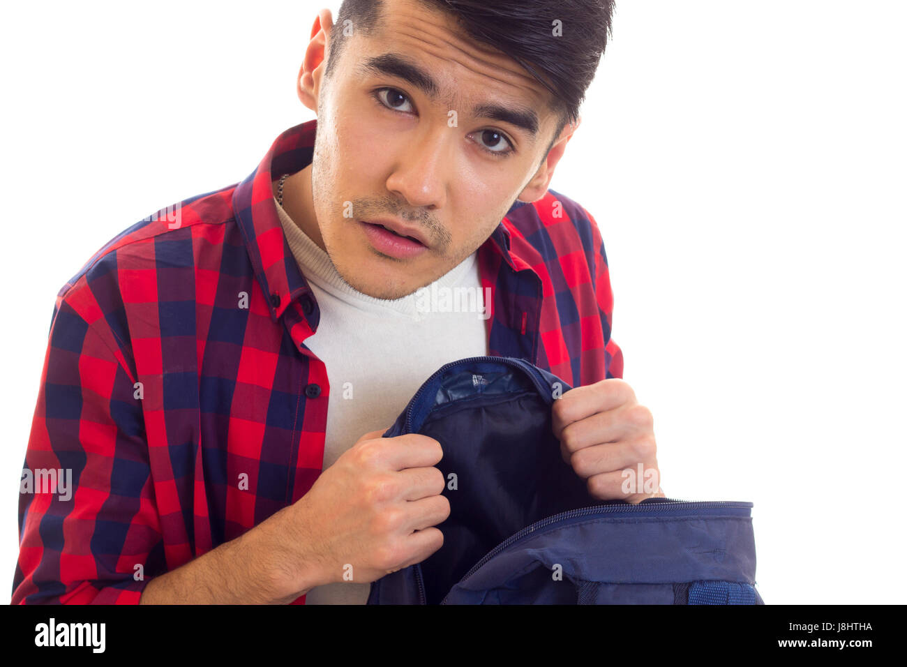 Young man with backpack Stock Photo - Alamy